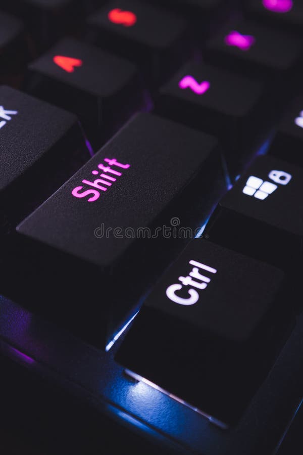 Black Keyboard Keys with Colorful Lights Underneath Stock Photo - Image ...