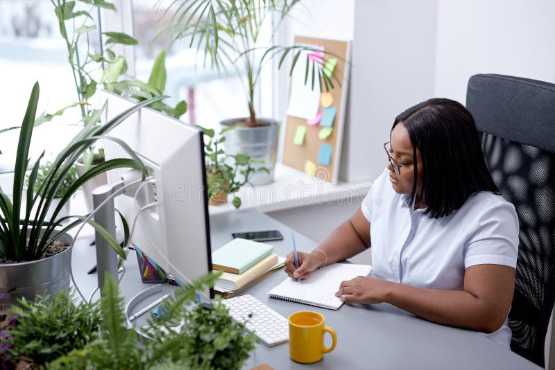 Black Lady Office Worker Concentrated on Work, Writing Documents ...