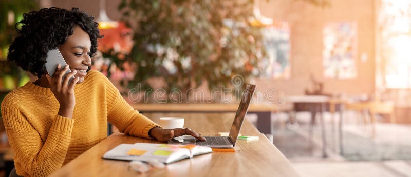 Black Lady Talking on Mobile Phone and Using Laptop Stock Image - Image ...