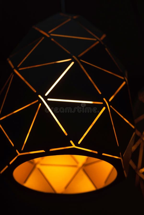 Black Lamps with a Geometric Pattern, Three Lamps on a Black Background ...