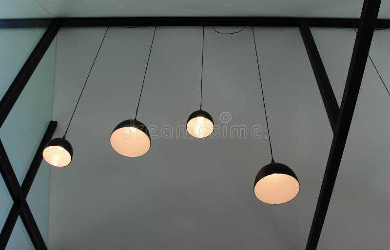 A Modern Lamp Hanging on the Ceiling Stock Image - Image of electrical ...