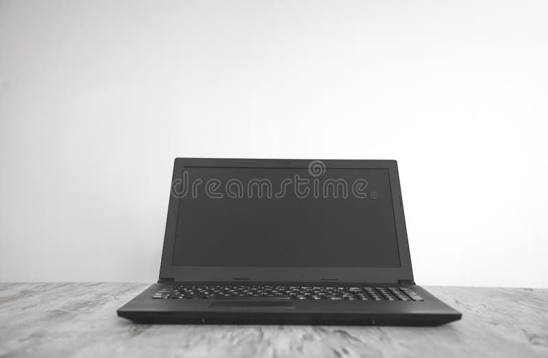 Black Laptop on the Office Desk. Technology Concept Stock Photo - Image ...