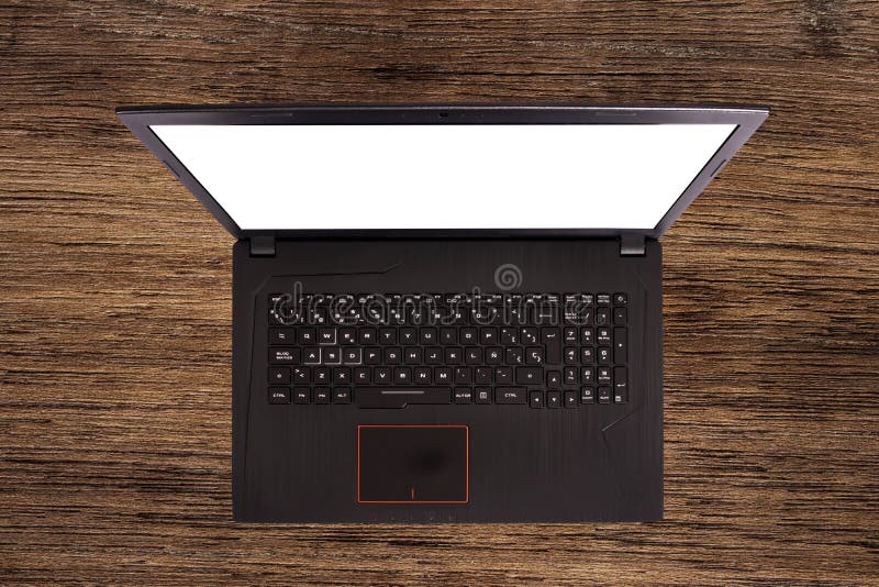 Black Laptop Over a Table. Notebook with Empty Screen Stock Image ...