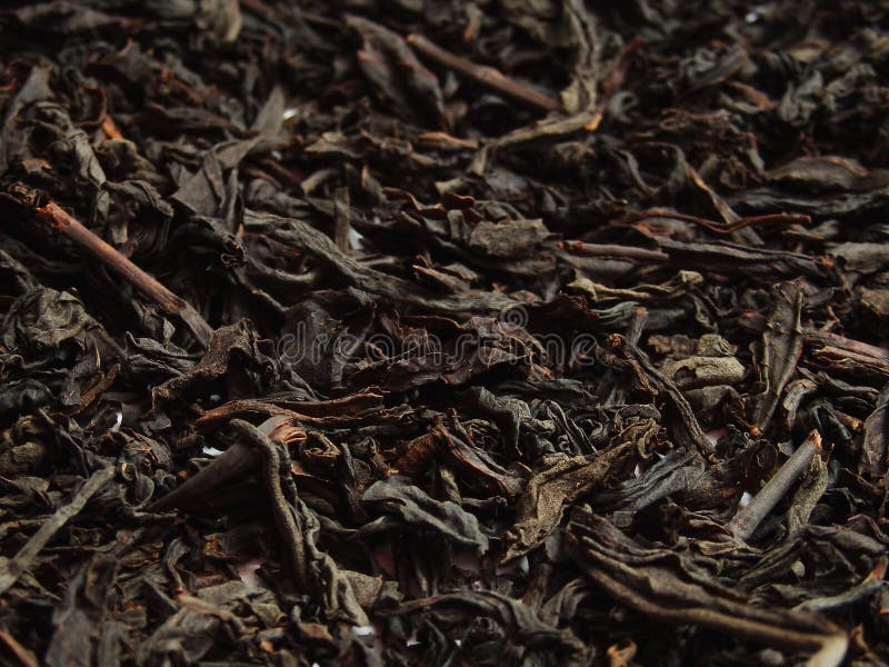 Black Large-leaf Tea As a Background. Texture of Dry Black Tea Leaves ...