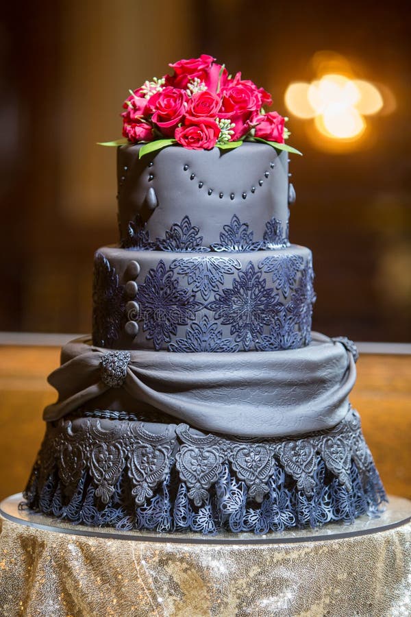 Black Large Wedding Cake with Red Roses on the Top Stock Photo - Image ...