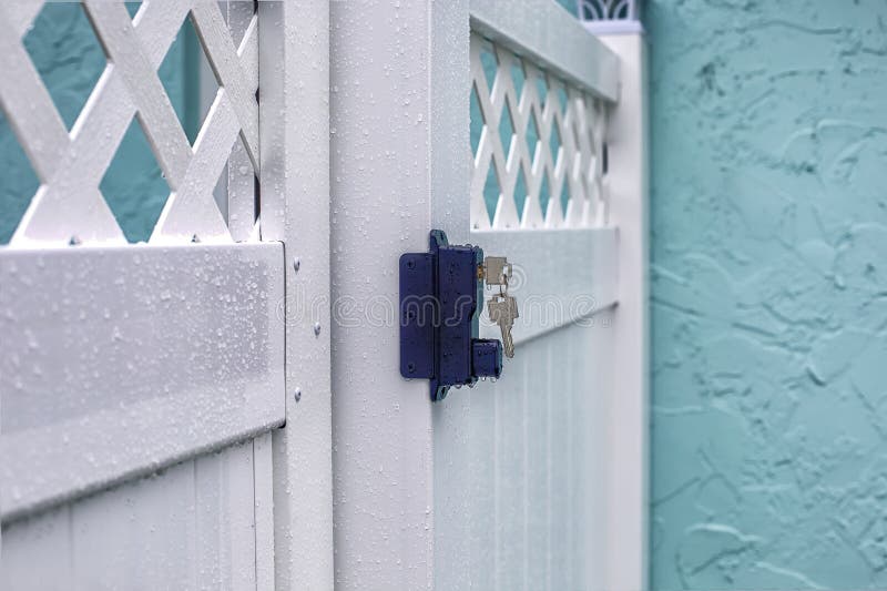 Black Latch on Gate White Vinyl Fence Stock Image - Image of glass ...