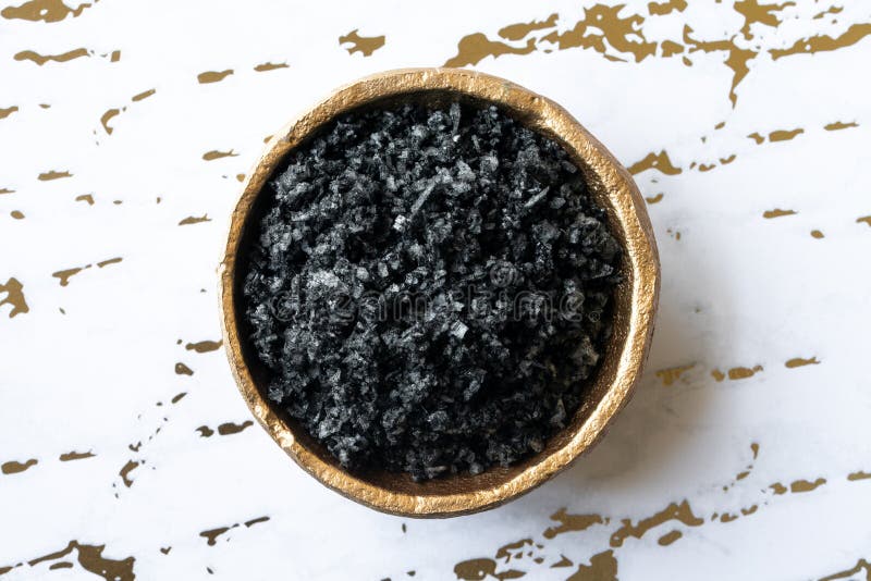 Black Lava Salt in a Bowl stock image. Image of bowl - 285280963