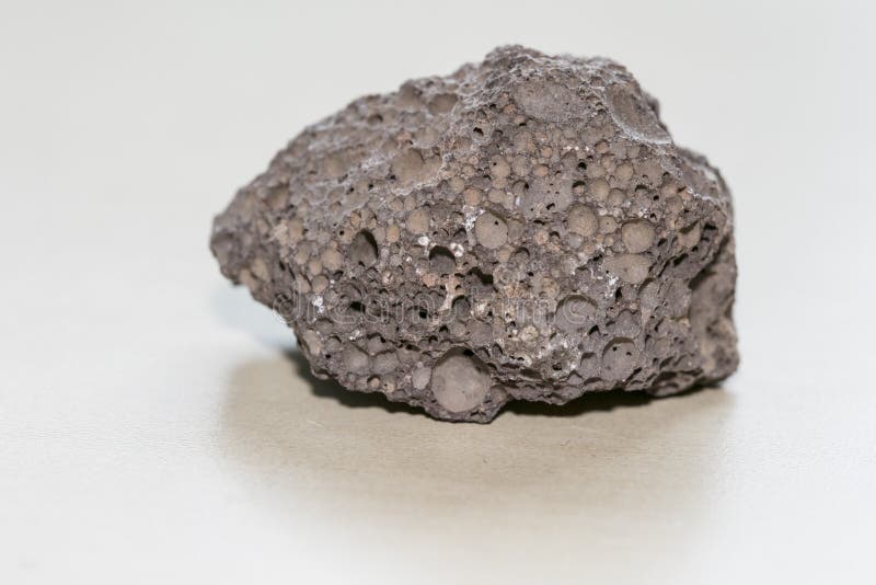 Black Lava Stone with Holes Stock Photo - Image of stone, mineral ...