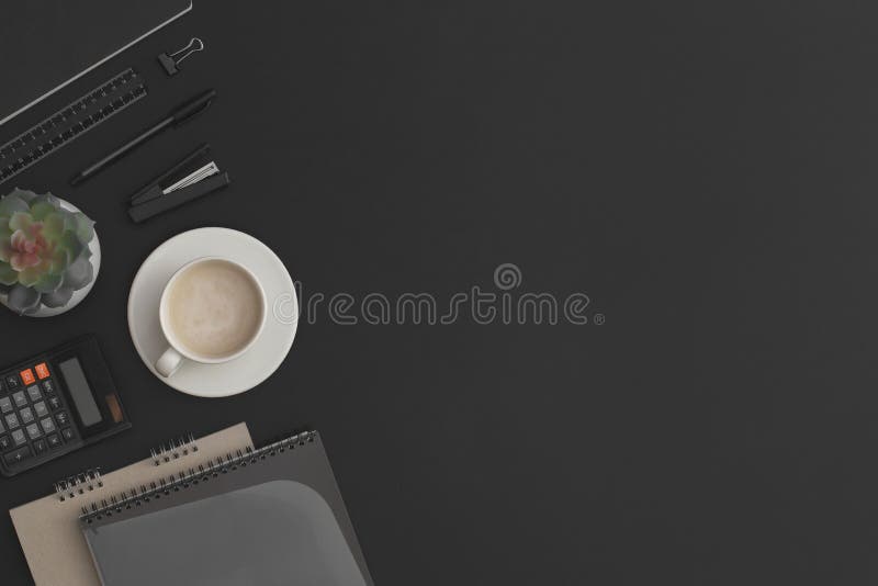 Black Leather Office Table with Calculator, Notebook, Coffee Cup and ...