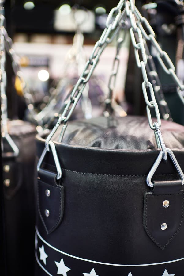 Black leather Punching bag stock image. Image of indoors - 100327139