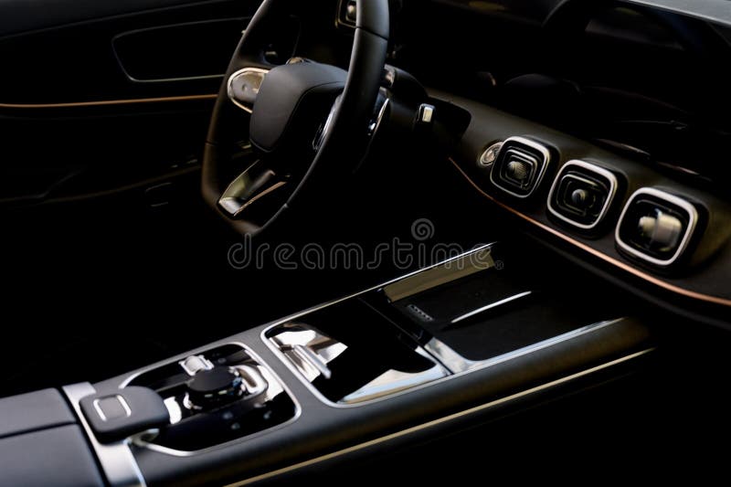 Black Steering Wheel and Automatic Transmission Selector in a Modern ...