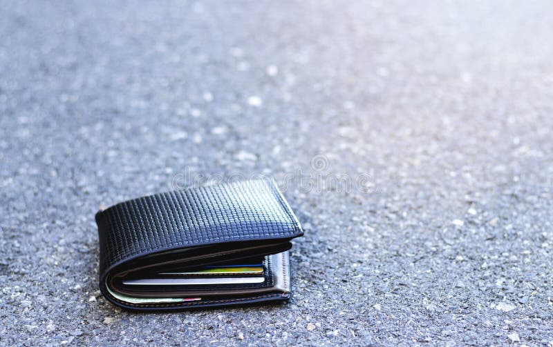 Black Leather Wallet Drop on the Road. Stock Photo - Image of person ...