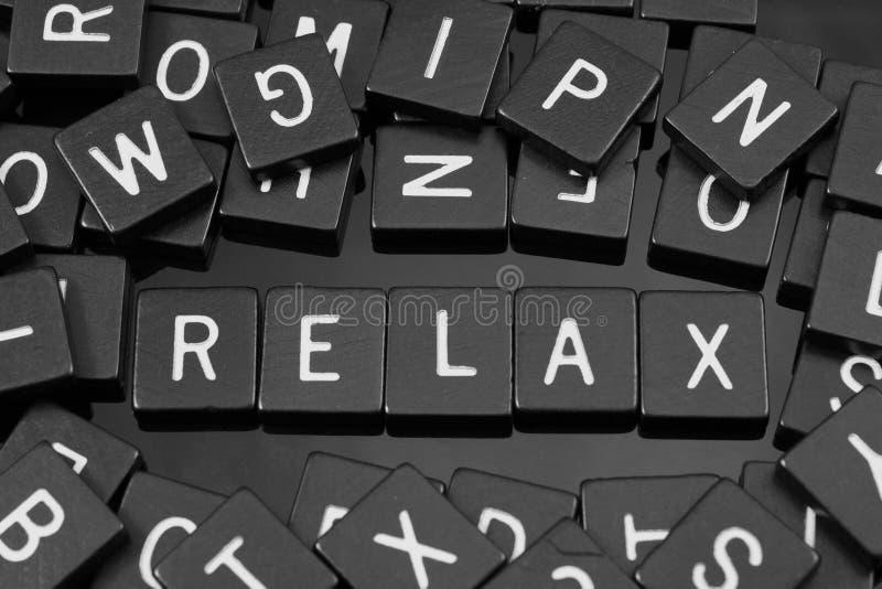 Black Letter Tiles Spelling the Word & X22;relax& X22; Stock Photo ...
