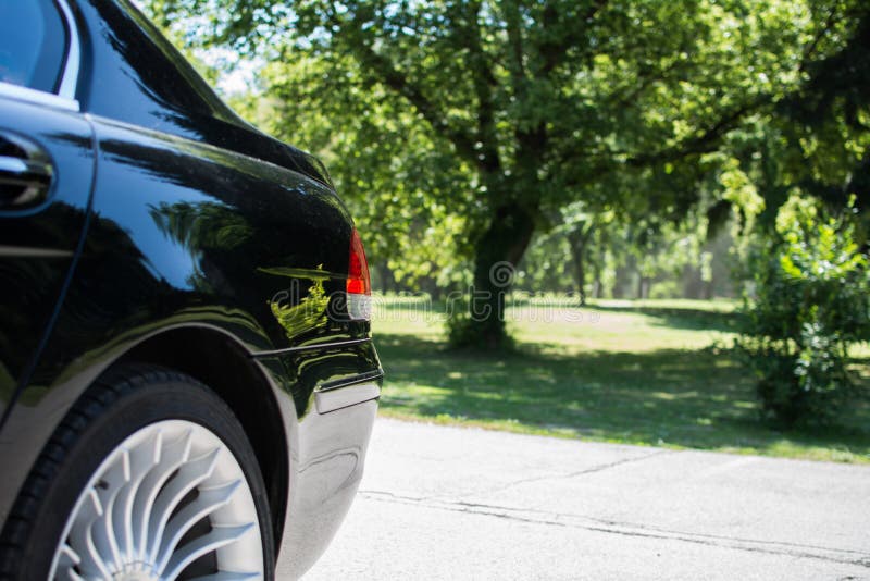 Black Limousine Back View, Parked in the Park Stock Image - Image of ...