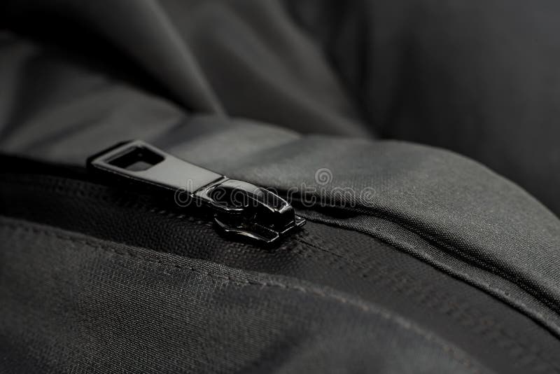 Black Lock with a Zipper on Clothes Close-up. Lock Stock Image - Image ...