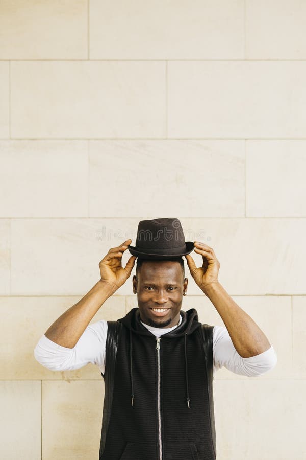 Black Male Taking Off His Black Hat Stock Image - Image of black, city ...