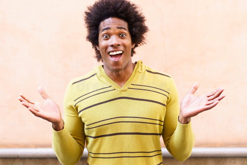 Black Man with Afro Hair Putting a Funny Expression Stock Image - Image ...