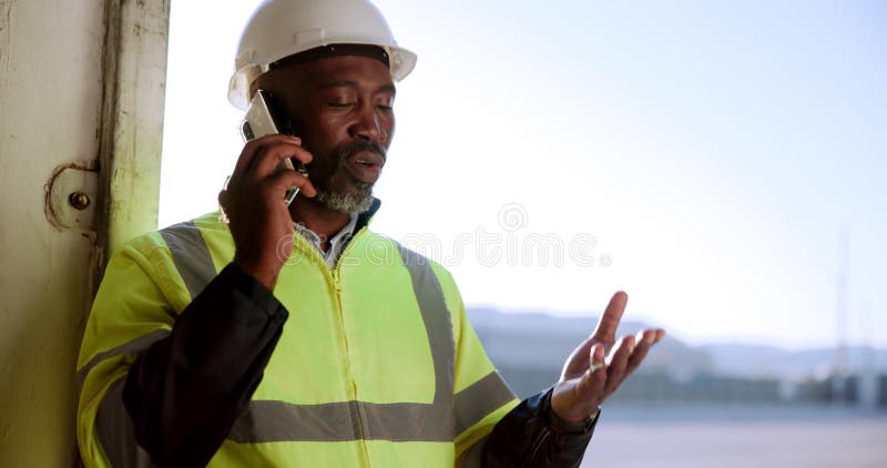 Black Man, Architect and Talking with Phone Call for Discussion, Construction or Maintenance at ...