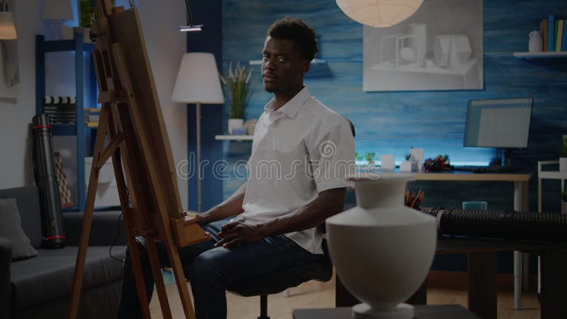 Black Man in Art Studio Preparing for Creativity Process Stock Footage ...