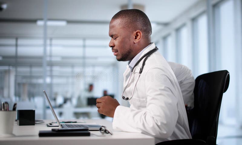 Black Man with Bad Posture Sitting in Office Stock Photo - Image of ...