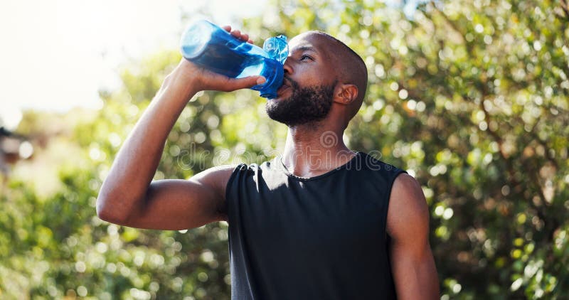Black Man, Bottle and Drinking Water for Running, Break and Hydration ...