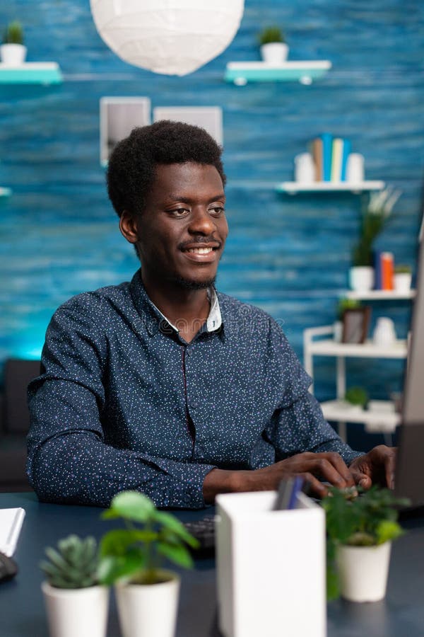 Black Man Computer User Working from Home at Cozy Desk Stock Photo ...