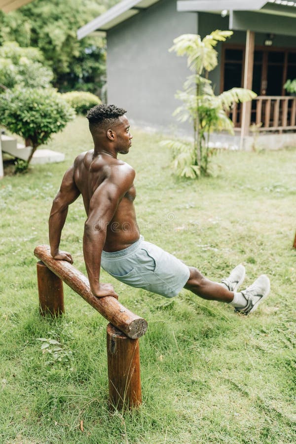 Black Man Doing Triceps Dip Exercise on a Bench. Stock Photo - Image of strength, arms: 259185092