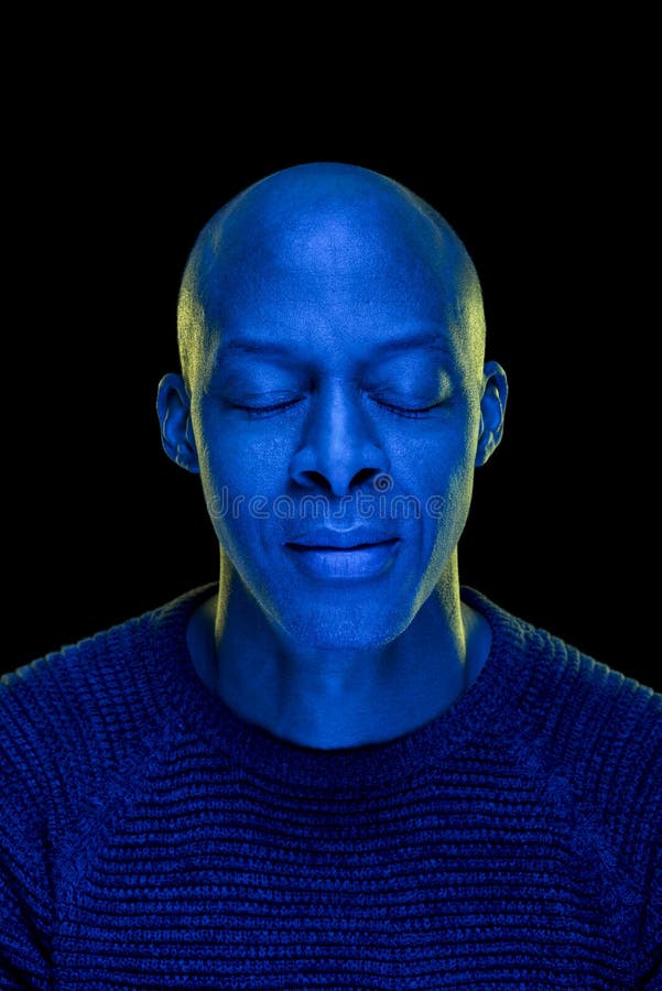 Concept of Concentration and Mind. Black Man with Blue Light Stock ...