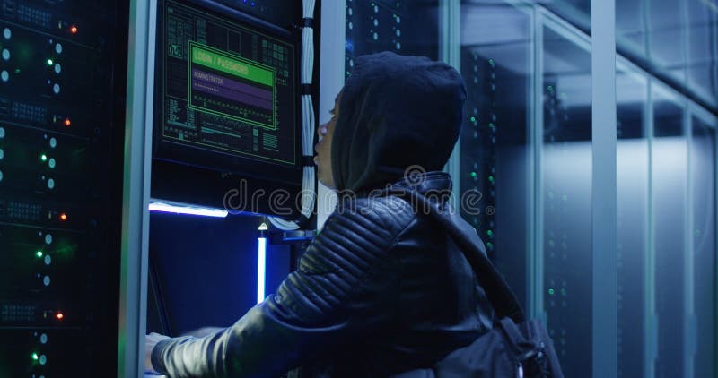 Black Man Hacking Computer System in Server Room Stock Image - Image of ...