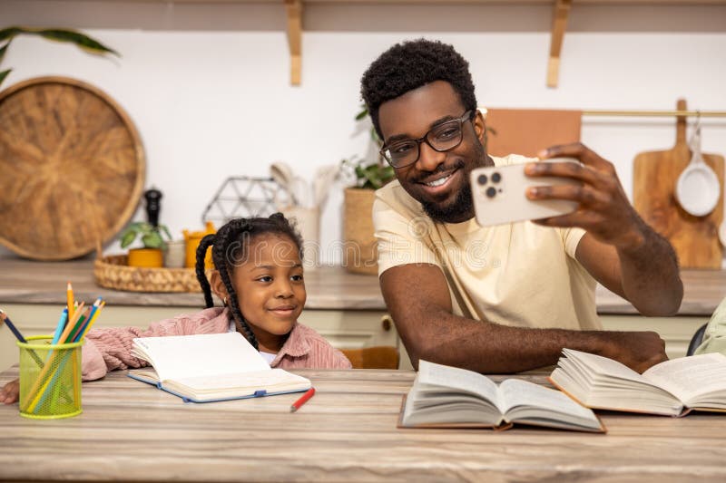 Pensive African American Girl with Pen and Notepad Doing Homework Stock ...