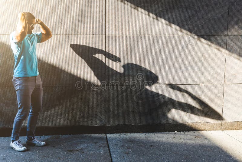Black Man Playing with His Shadow on the Wall Stock Photo - Image of ...