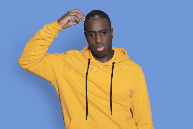 Smiling African Young Man Standing Pointing His Head Stock Photos ...