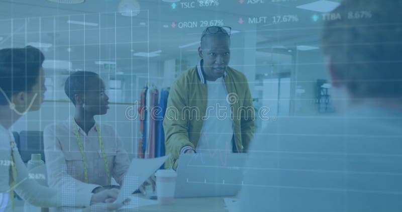 Black Man Presenting in Open-plan Office, with Laptop, Documents ...