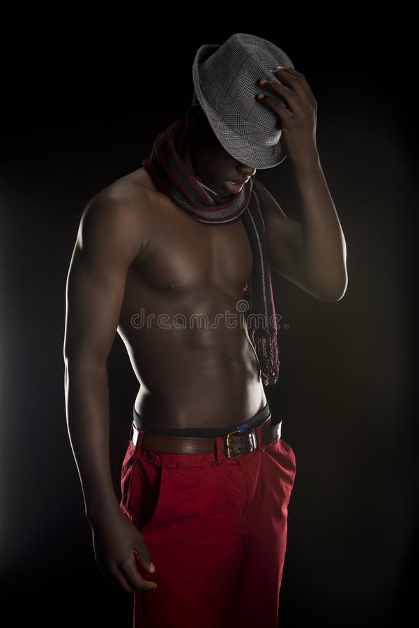 Black man removing his hat stock photo. Image of beauty - 27438166