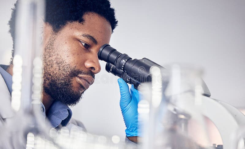 Black Man, Scientist and Microscope with Science Research in Laboratory ...