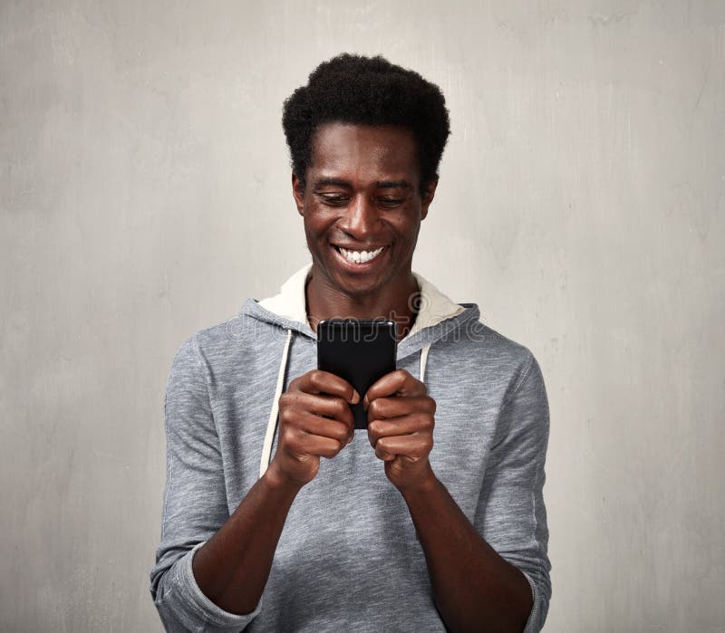 Black man with smartphone stock photo. Image of casual - 88383902