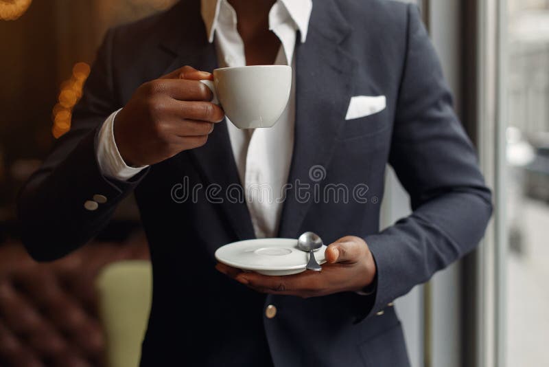 Black Man Standing in a Cafe and Drinking a Coffee Stock Image - Image ...