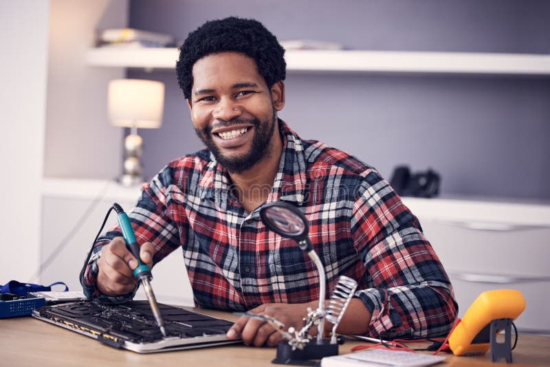 Black Man, Technician Fixing Electronics and Tablet Hardware, Soldering ...