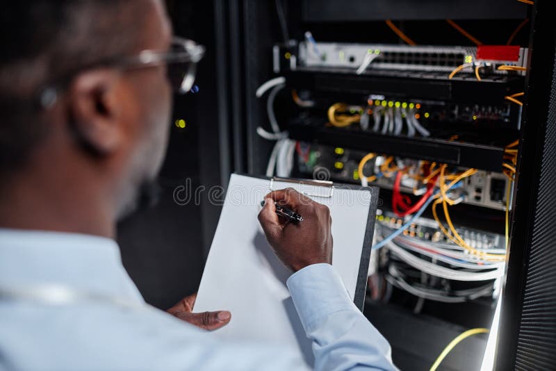 Black Man Working with Server Cabinet in Data Center Stock Image ...
