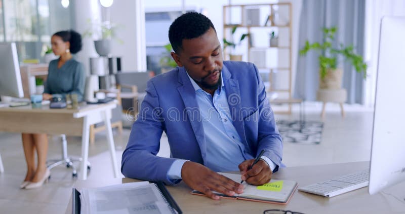 Black Man, Writing and Book for Research on Computer Taking Notes for ...