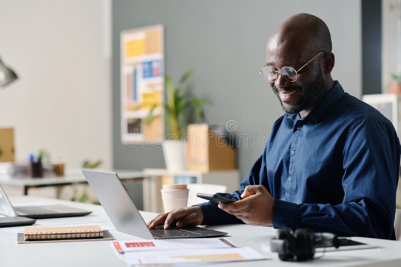 Black Manager Working on Laptop in Modern Office Stock Image - Image of ...