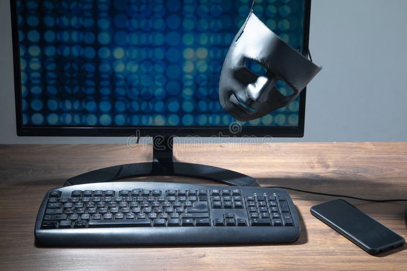 Black Mask and Computer on the Table Stock Photo - Image of identity ...