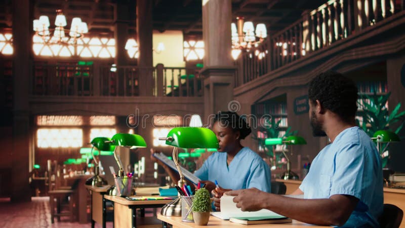 Black Med School Students Team Reading Anatomy Textbooks and Class ...