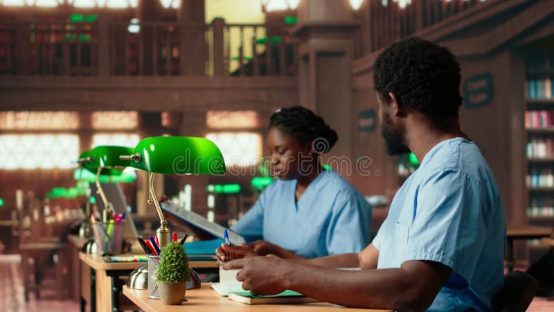 Black Med School Students Team Reading Anatomy Textbooks and Class ...