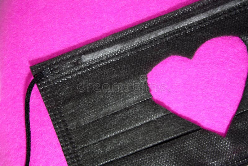 Black Medical Mask with Heart on Pink Background Stock Photo - Image of ...
