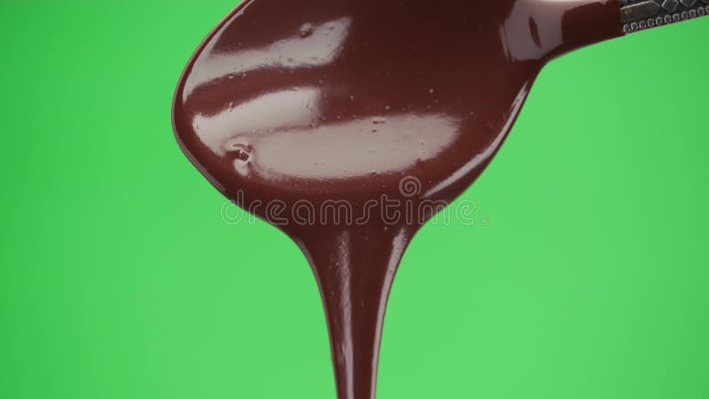 Black Melted Chocolate Pouring on a Green Screen Background Stock ...