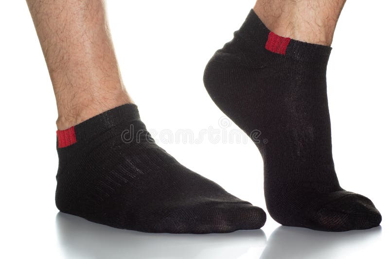 Black Men S Socks with a Red Insert on the Feet, Legs in Socks on a ...
