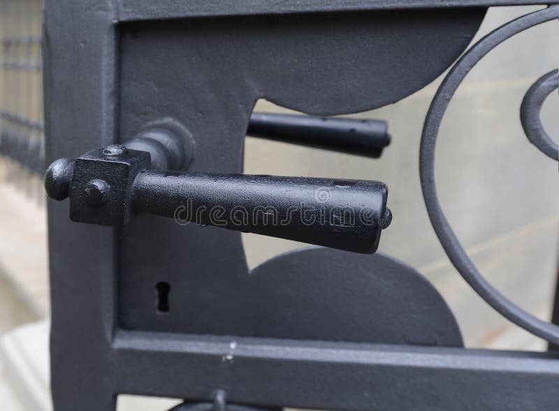 Black Metal Door Handle on Exterior Metal Door. Stock Image - Image of ...