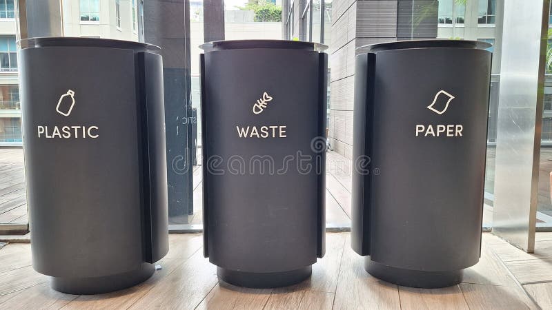 3 Black Metal Dustbin in a Row Stock Image - Image of black, interior ...