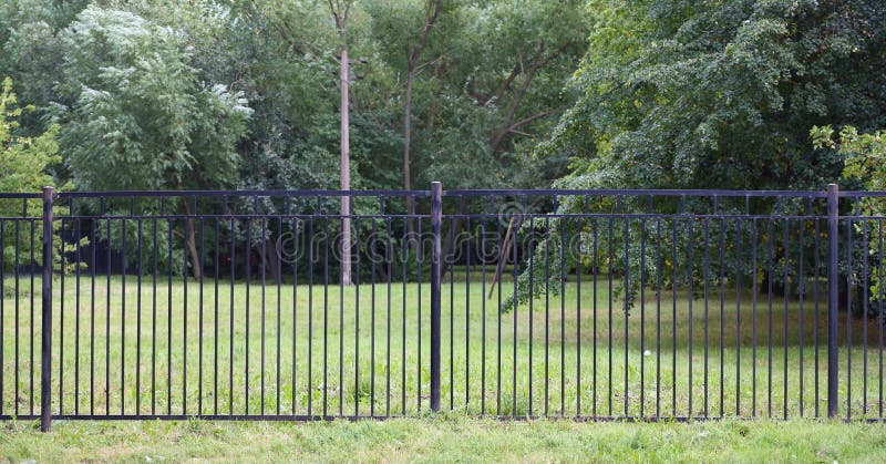 Black Metal Fence of the Green Park Stock Image - Image of fence ...